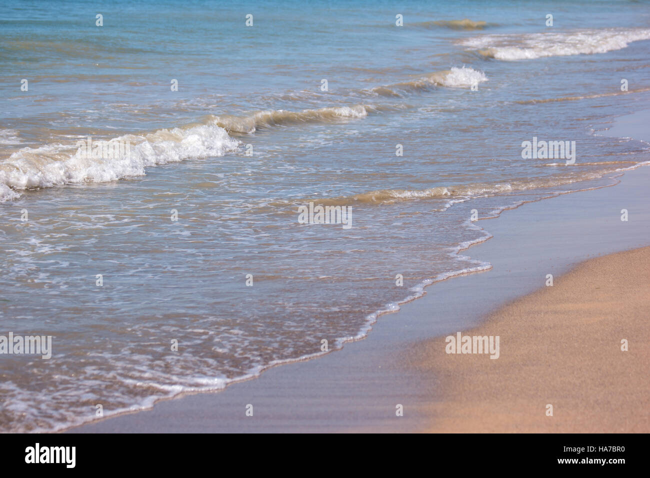 Water on the shore Stock Photo - Alamy