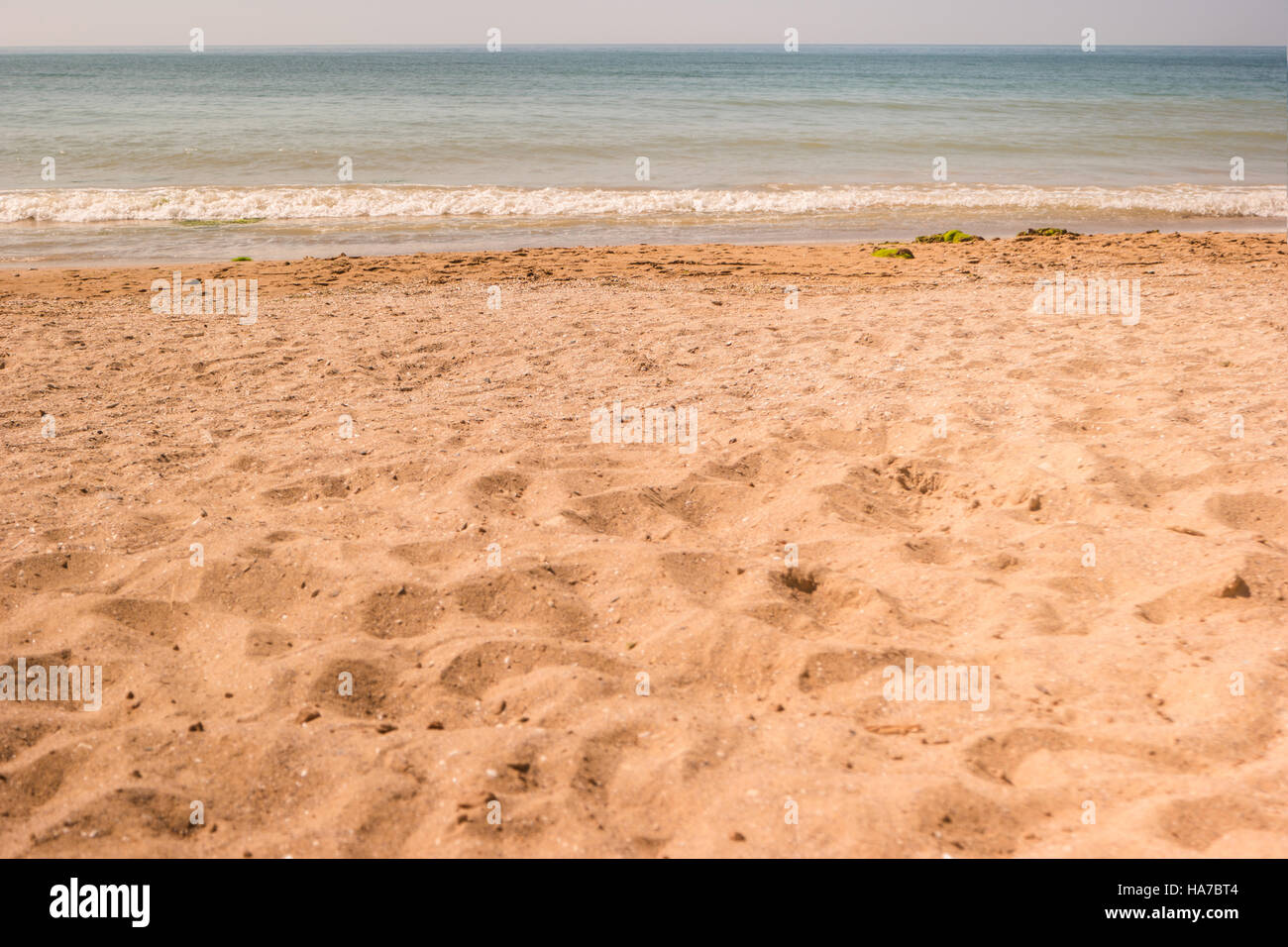 Sand on sea beach Stock Photo - Alamy