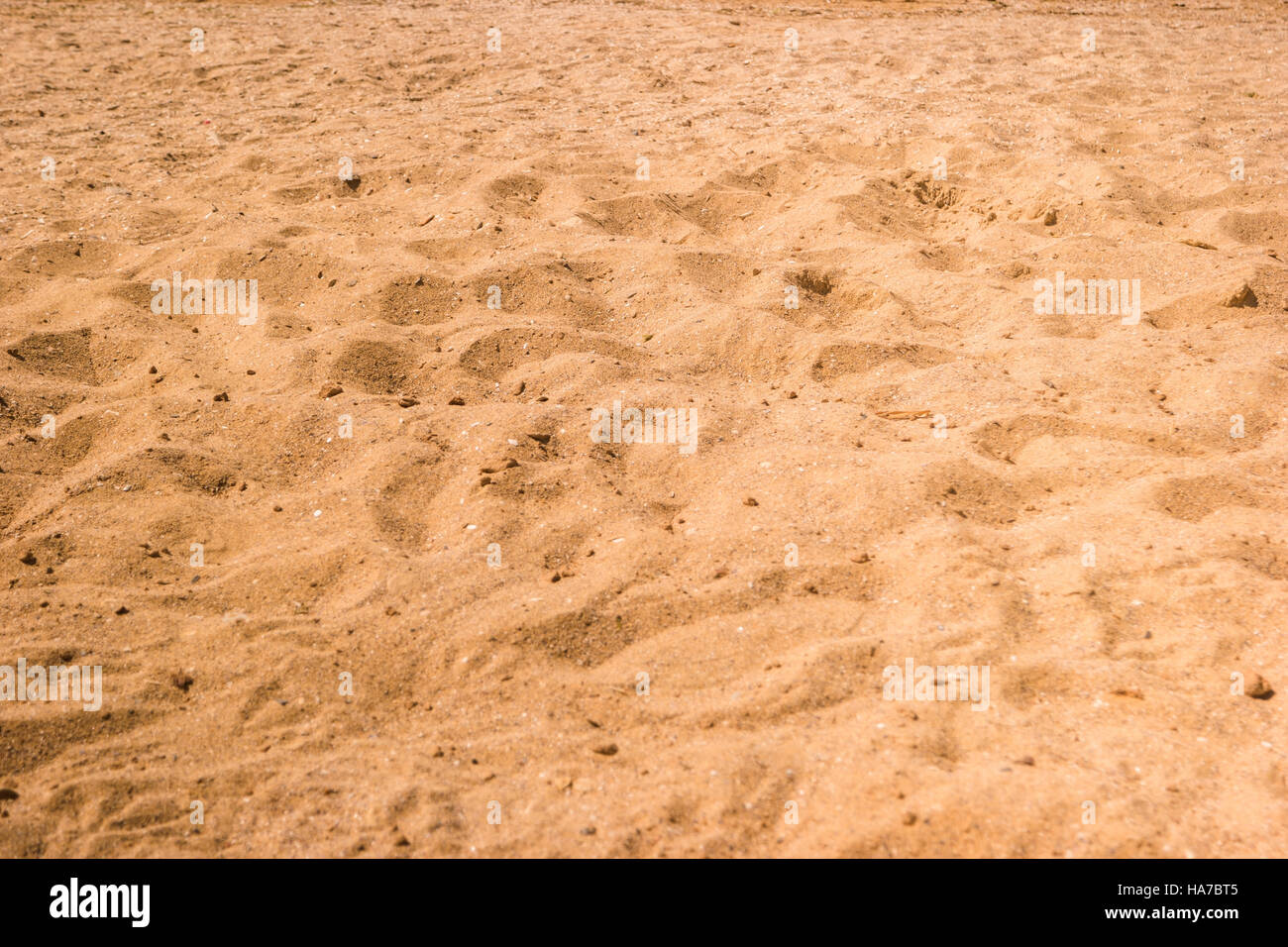 Yellow sand texture Stock Photo - Alamy