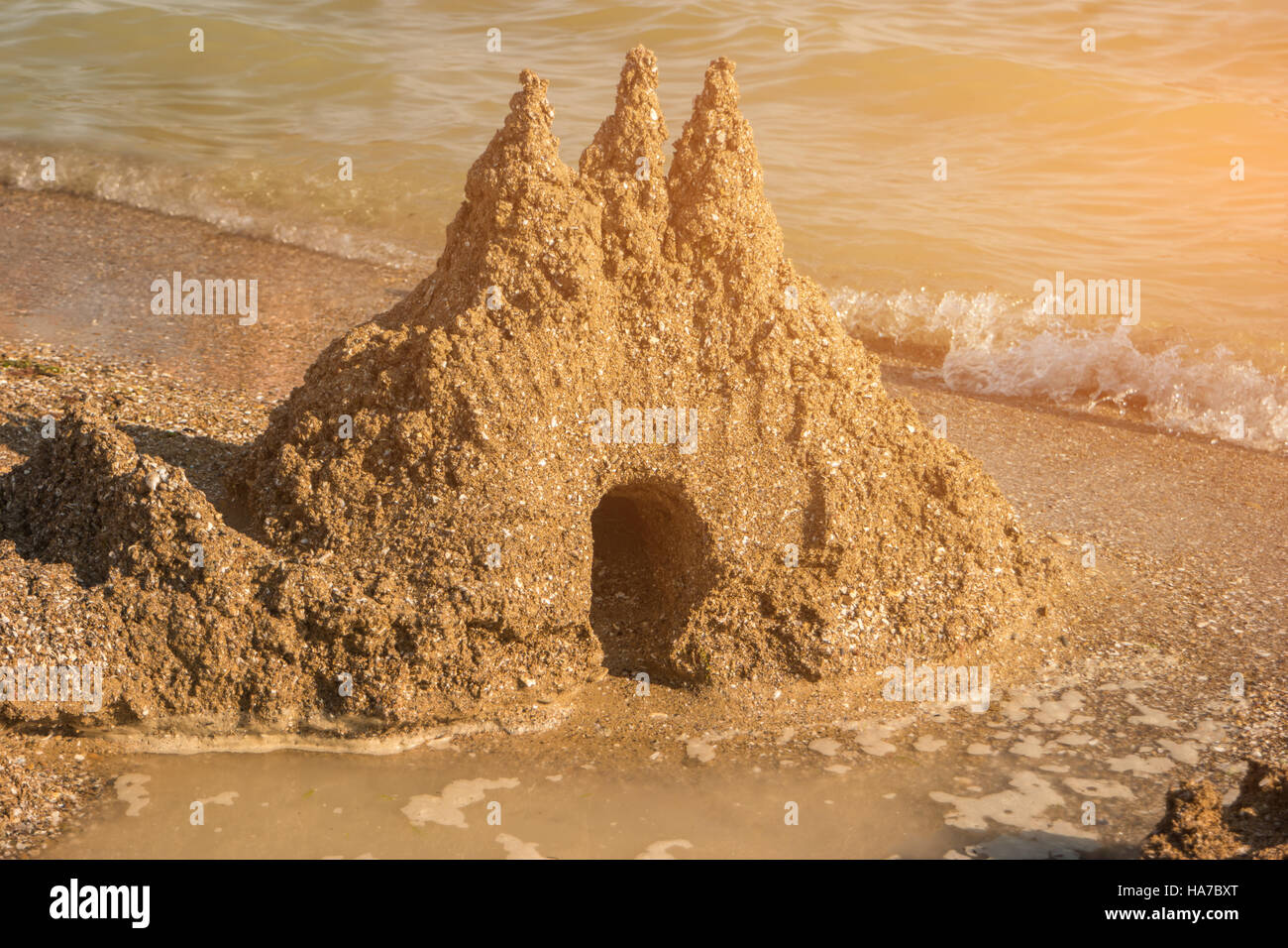 Sandcastle on shore Stock Photo - Alamy