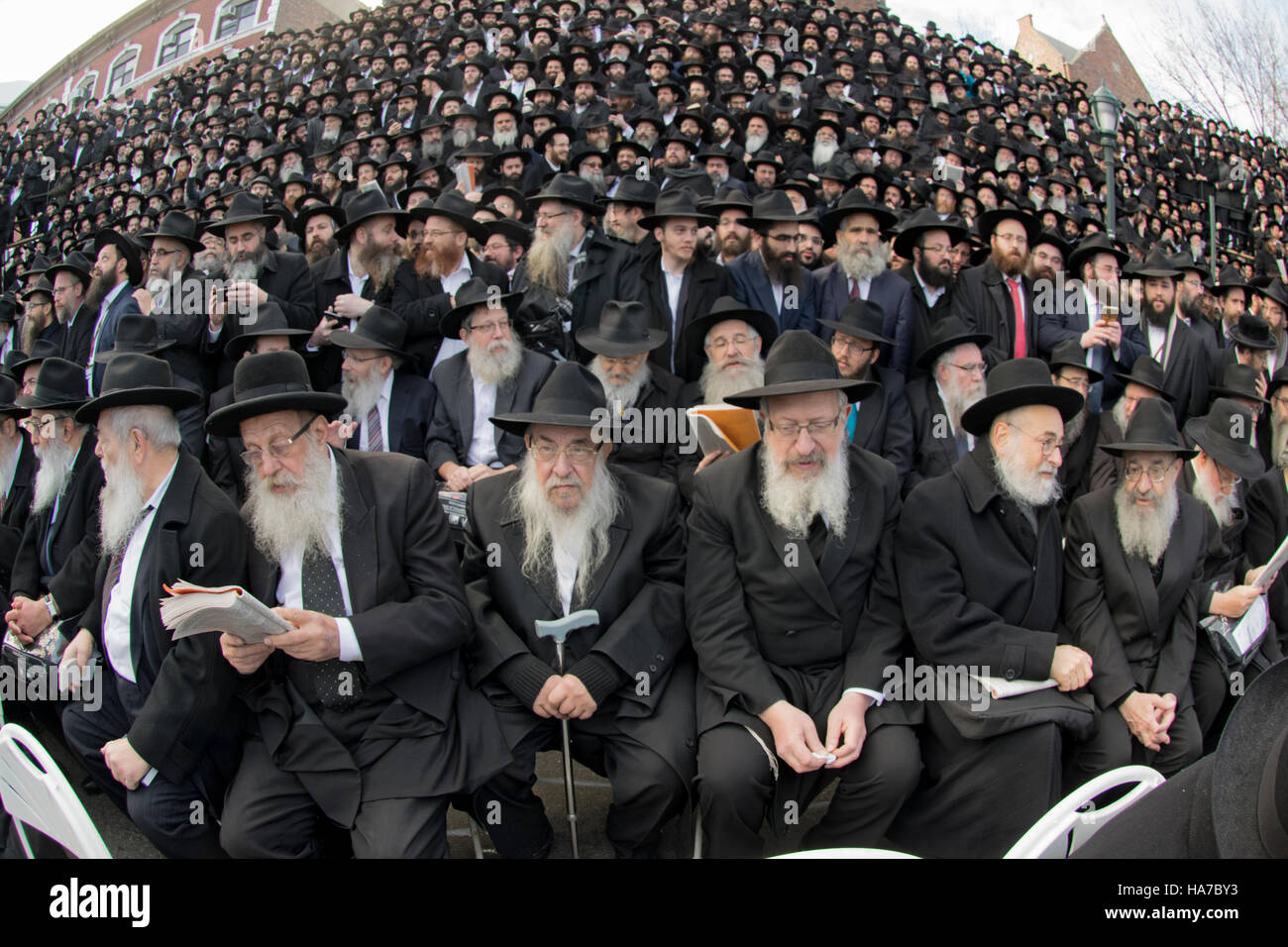 A fisheye lens view of a few thousand rabbis posing for annual group ...