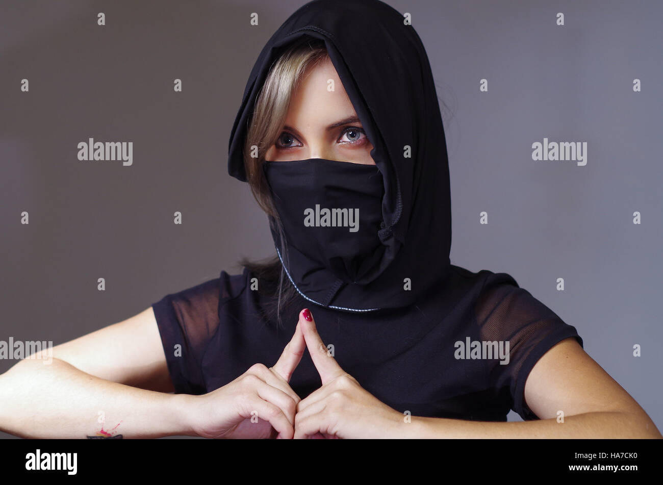 Headshot samurai woman dressed in black with matching veil covering ...