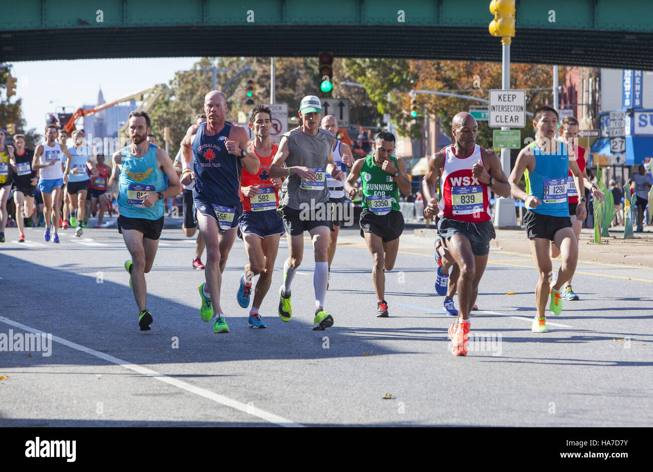 New York City Marathon runners on 4th Avenue in Brooklyn about 4 miles ...