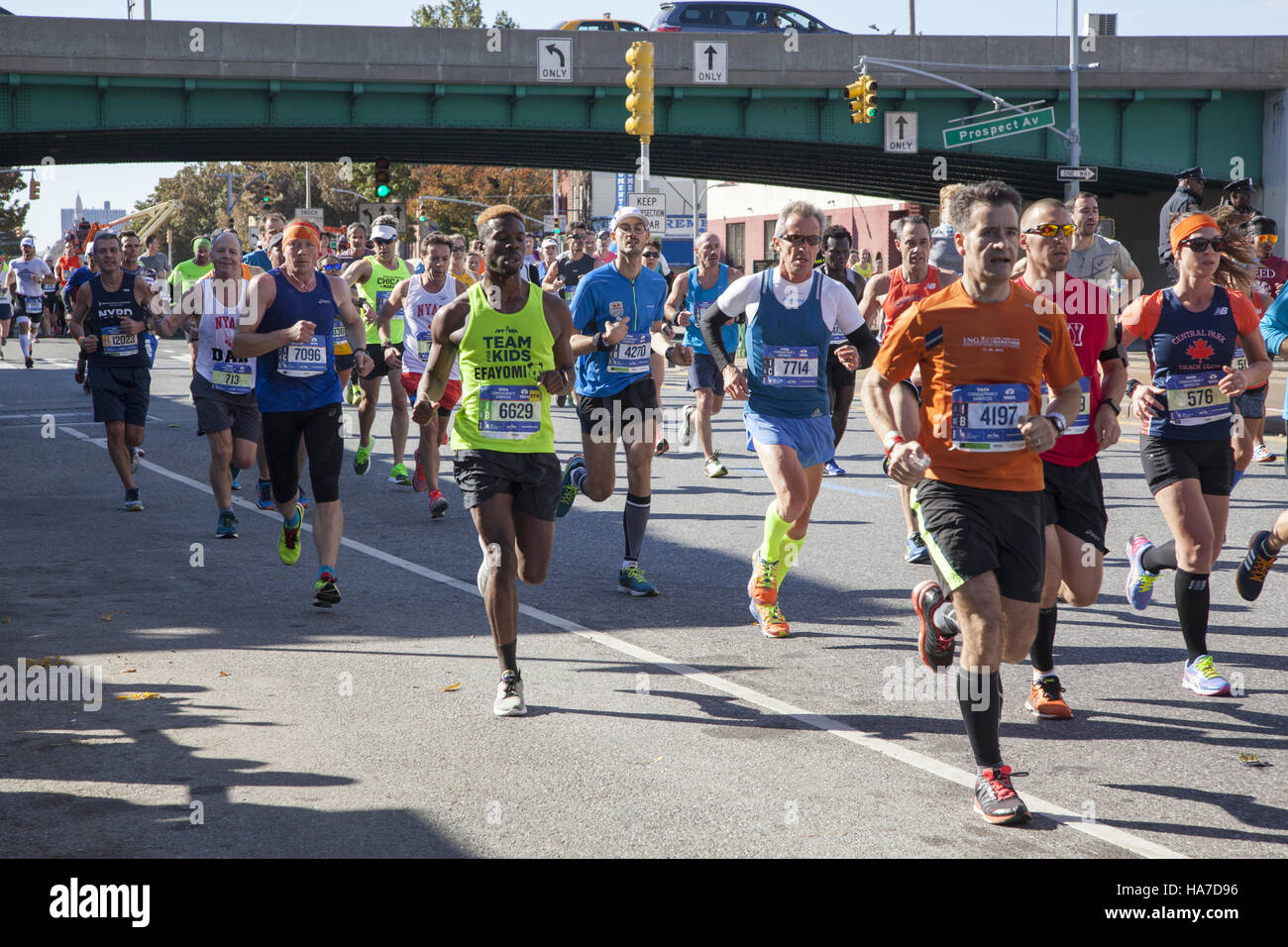 New York City Marathon runners on 4th Avenue in Brooklyn about 4 miles ...