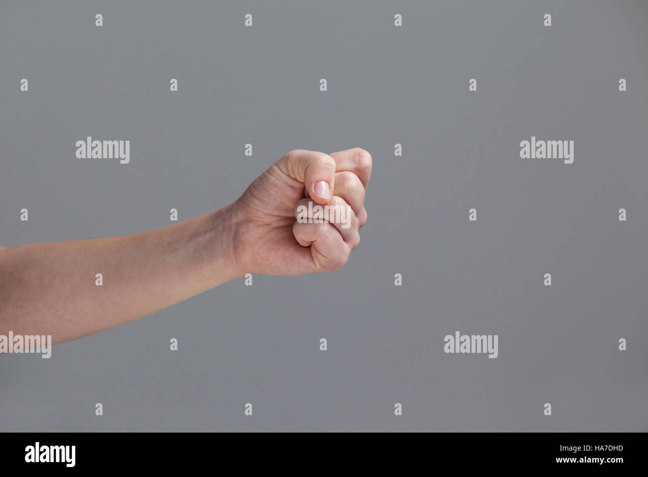 Clenched fist showing hi-res stock photography and images - Alamy