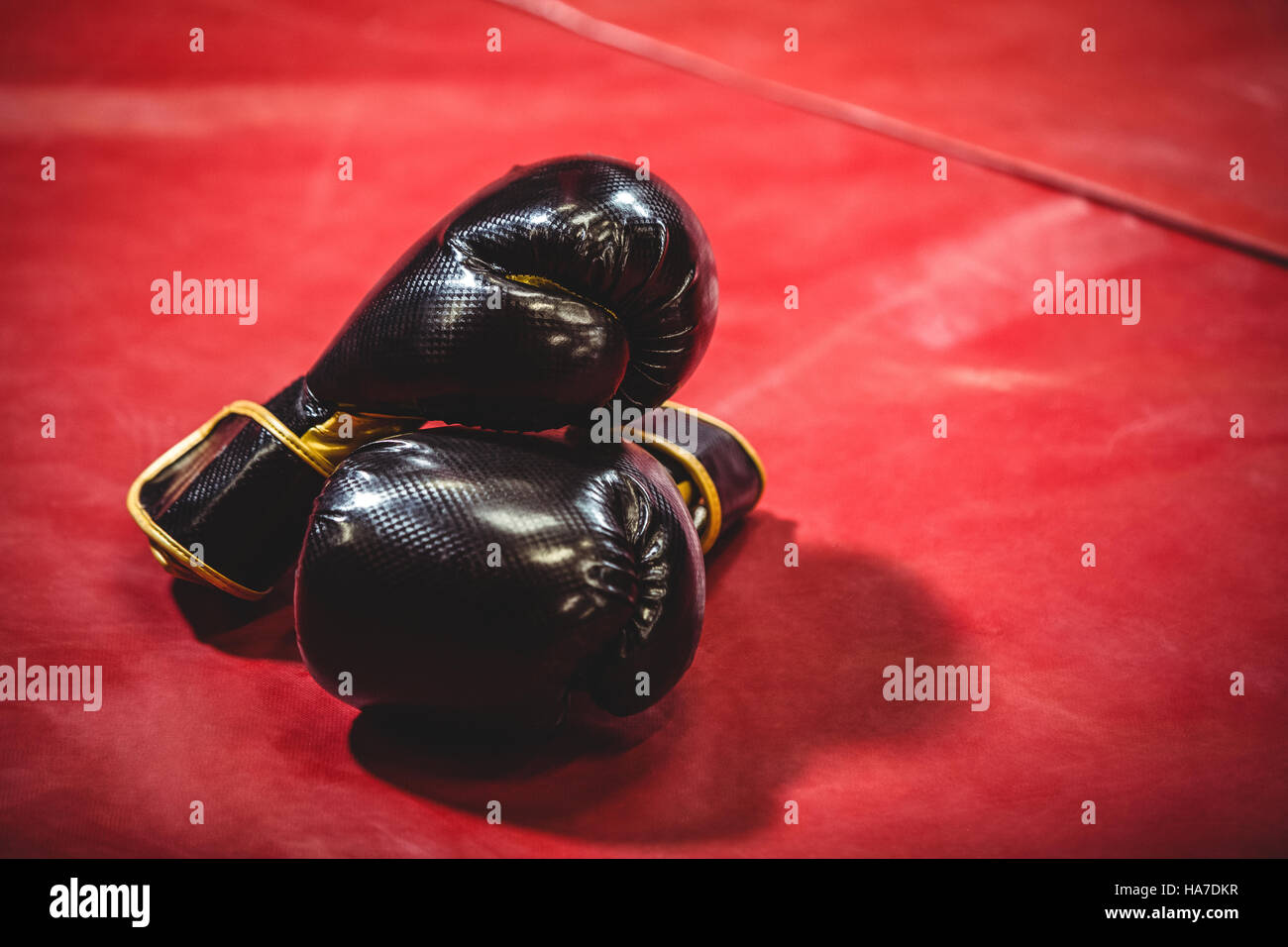Pair of black boxing gloves Stock Photo - Alamy