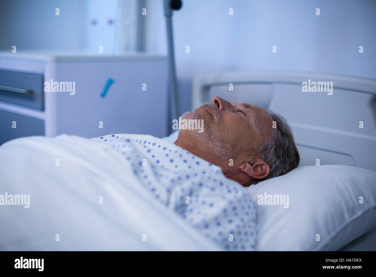 Patient relaxing on bed Stock Photo - Alamy
