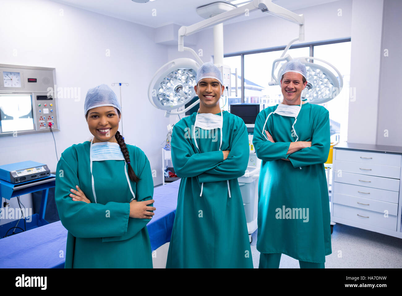 Portrait of surgeons team in operation theater Stock Photo - Alamy