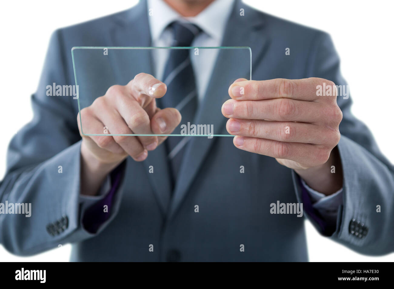 Businessman touching an glass sheet Stock Photo - Alamy