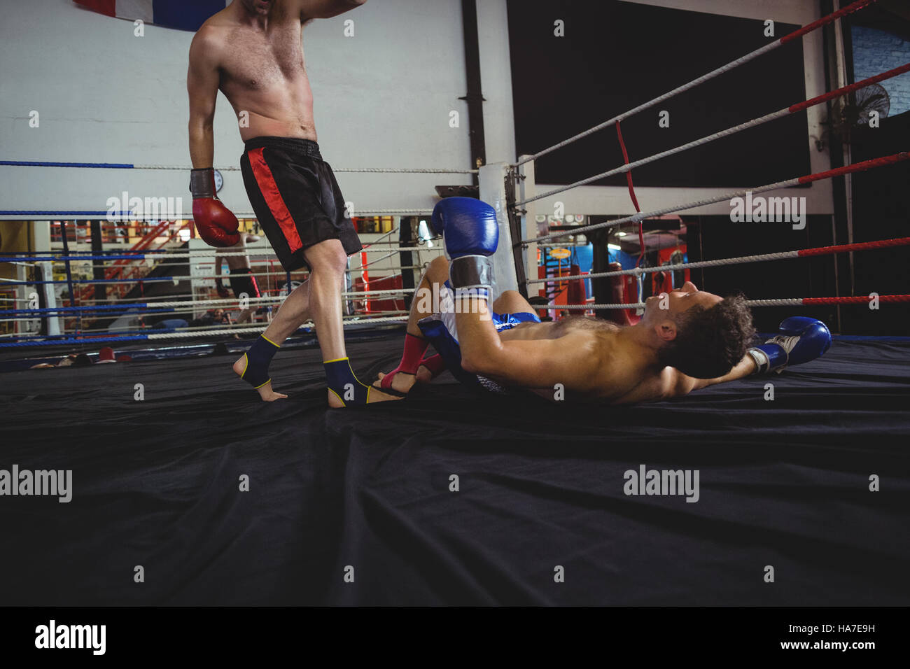 Boxers fighting in boxing ring Stock Photo - Alamy