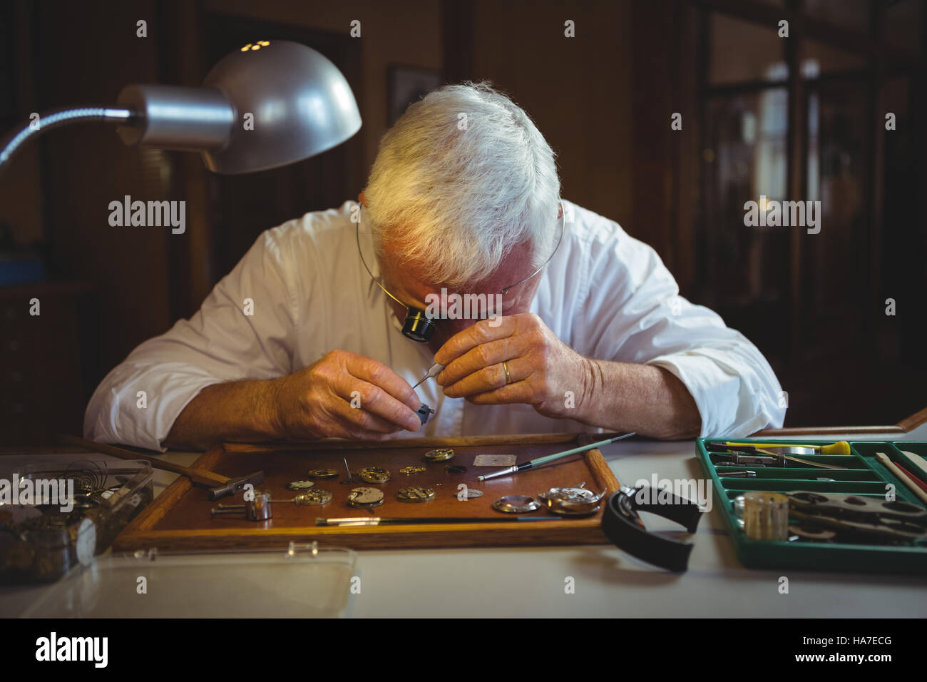 Horologist repairing a watch Stock Photo - Alamy