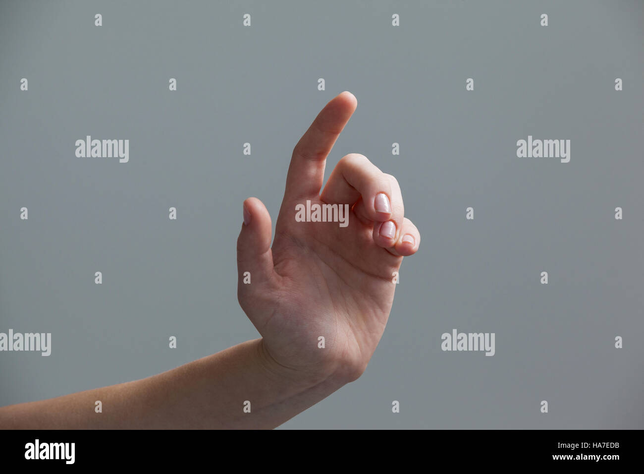 Hand of a woman making gestures Stock Photo - Alamy