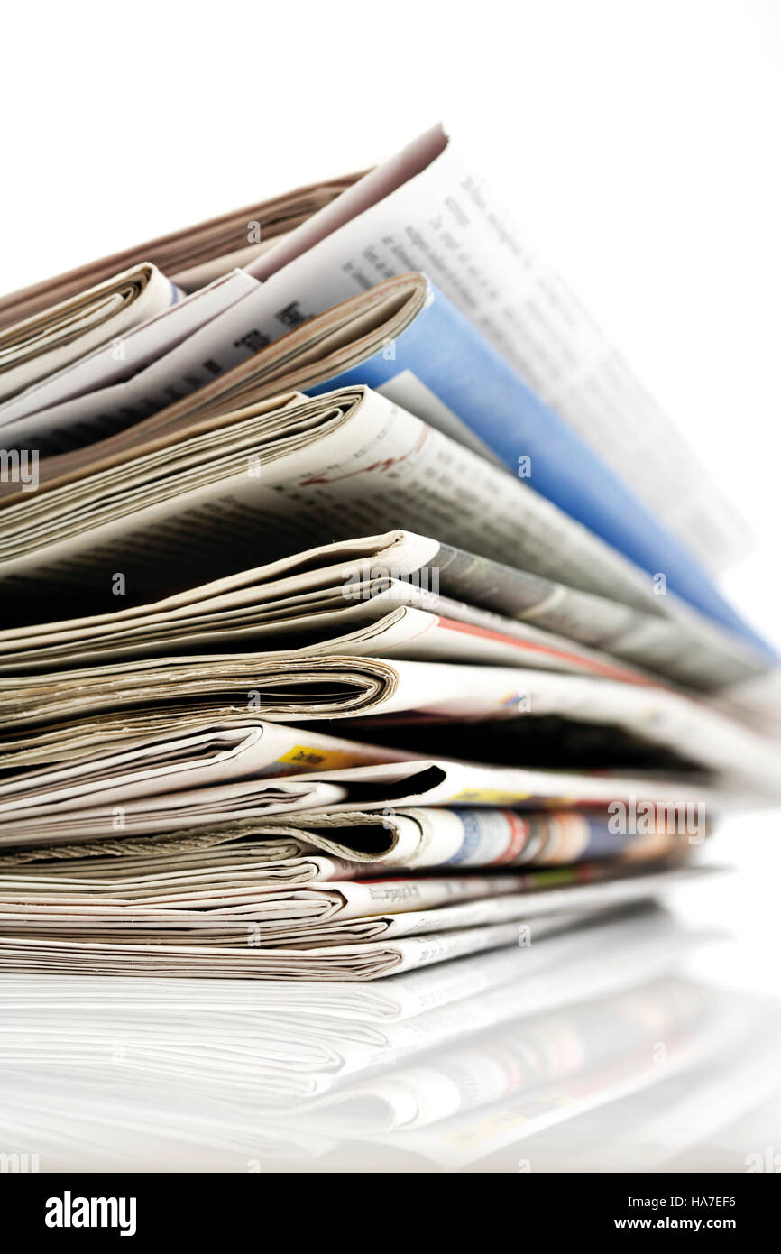 Stack of newspapers Stock Photo - Alamy