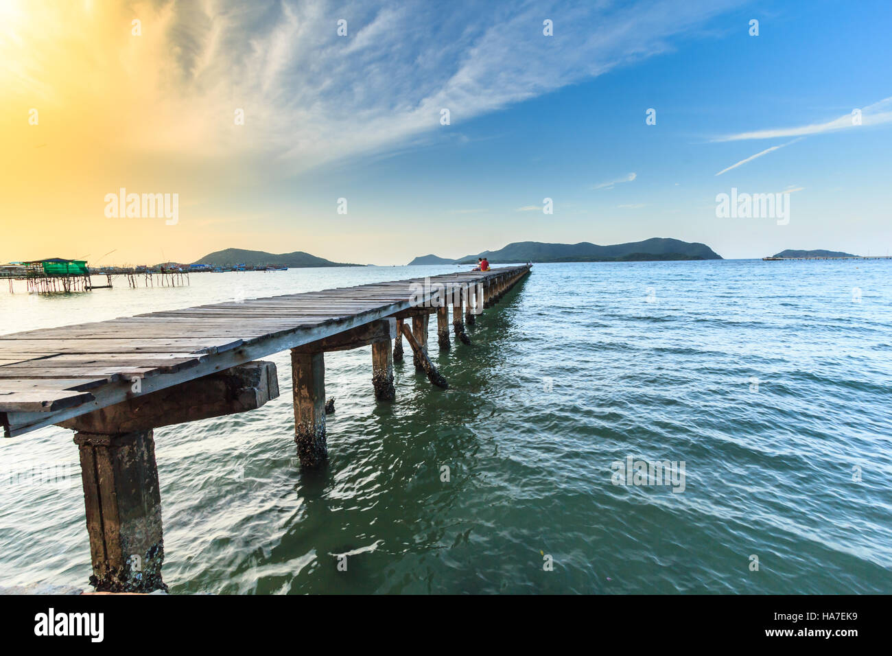 Beautiful sky and wooden bridge pier with twilight sky at morning time ...