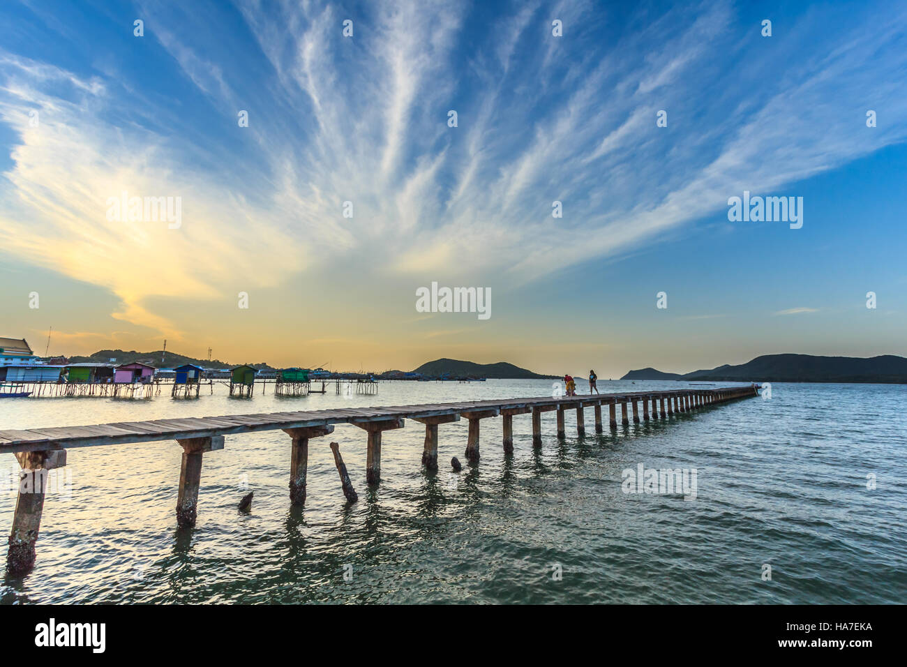 Beautiful sky and wooden bridge pier with twilight sky at morning time ...