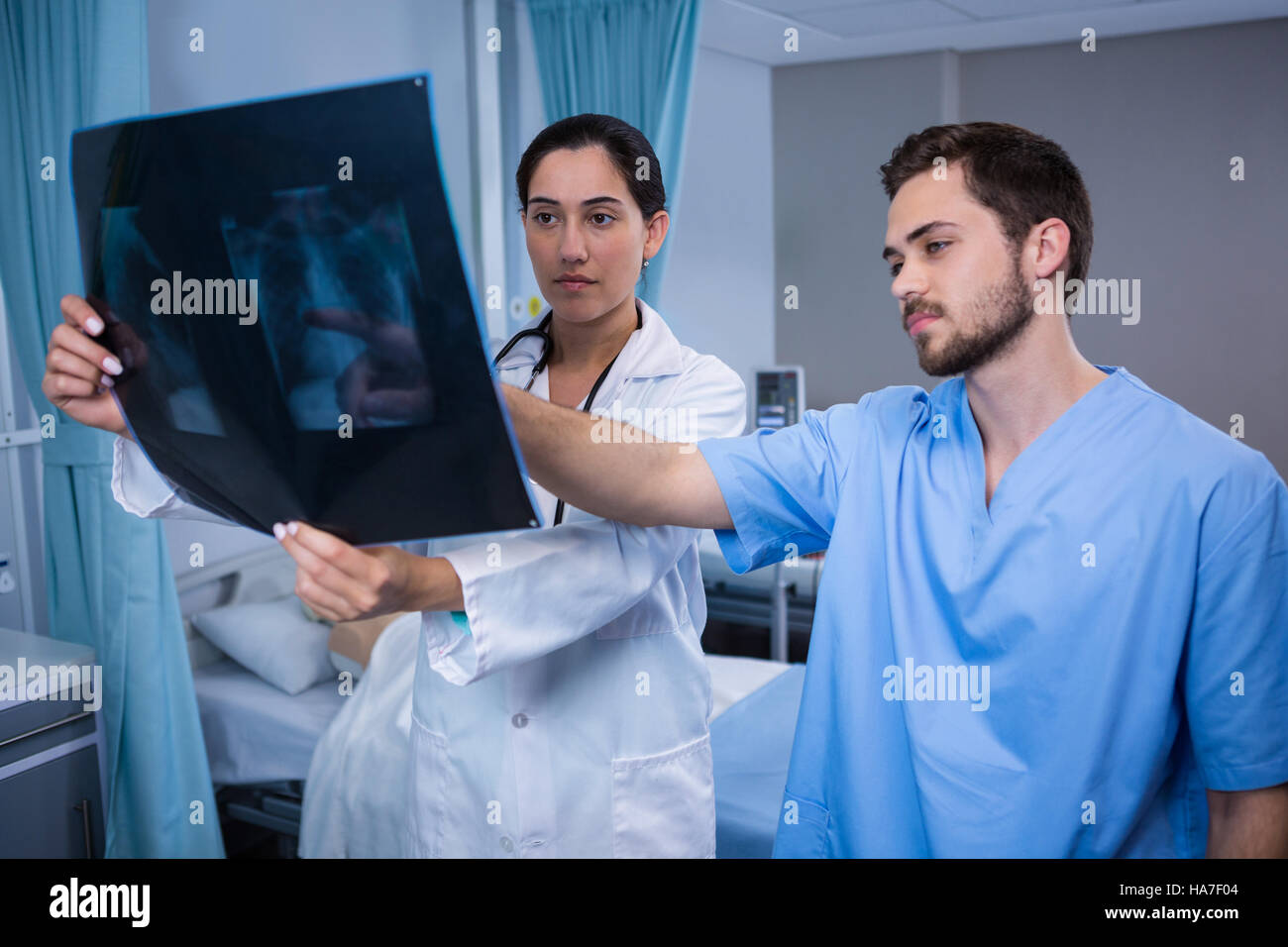 Doctors examining x-ray Stock Photo - Alamy