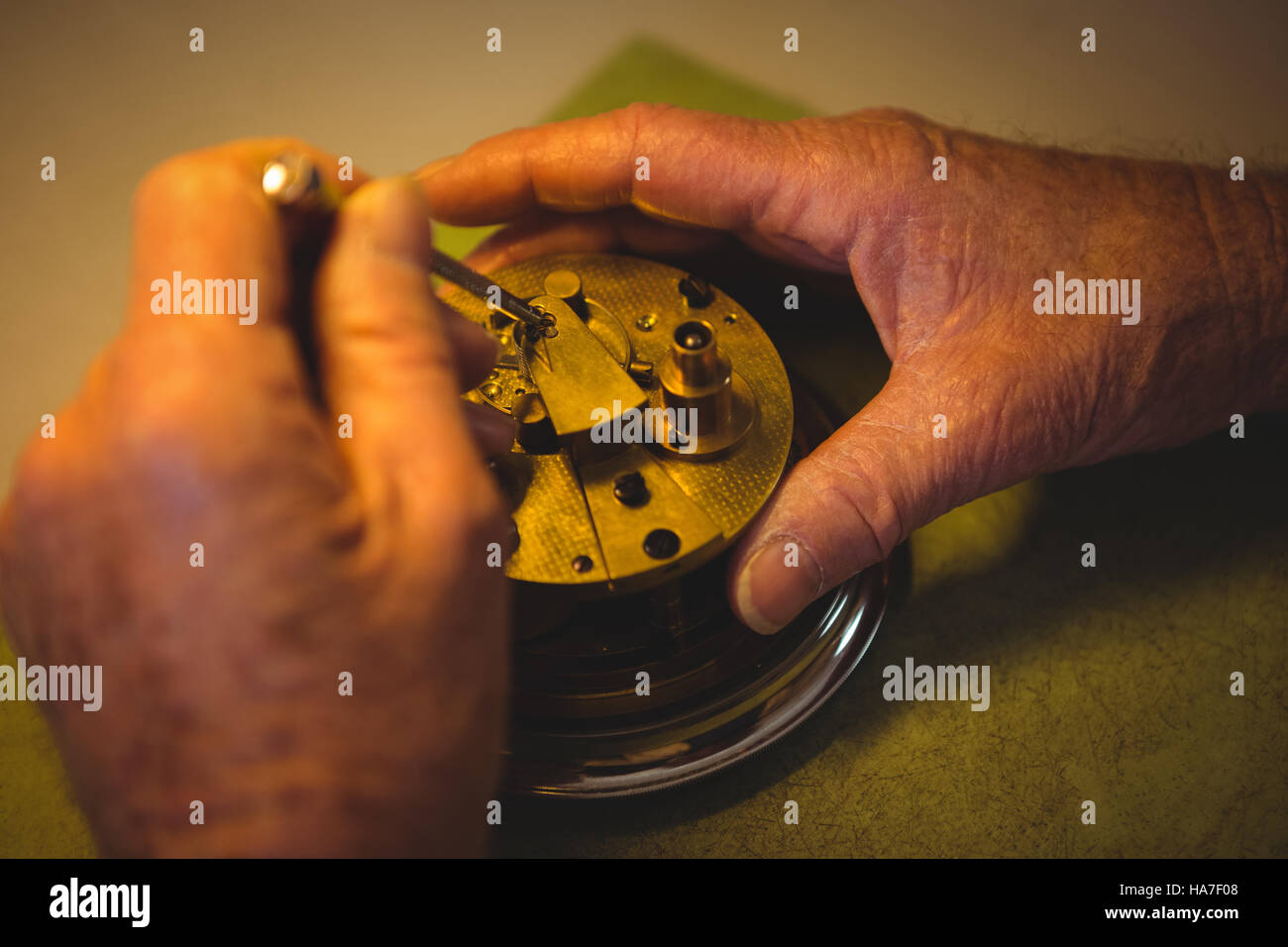 Horologist repairing a watch Stock Photo - Alamy