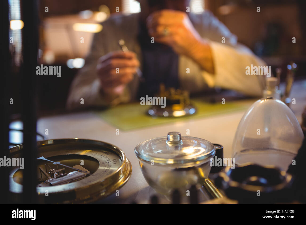 Horologist repairing a watch Stock Photo - Alamy