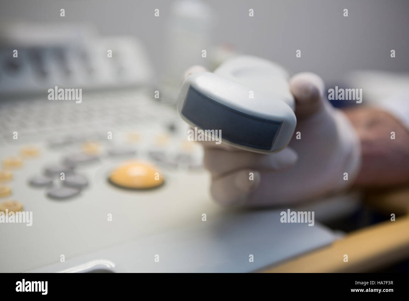 Doctors using sonography machine Stock Photo - Alamy