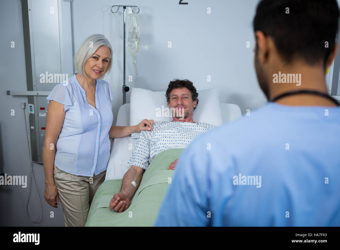 Smiling doctors interacting with each other Stock Photo - Alamy