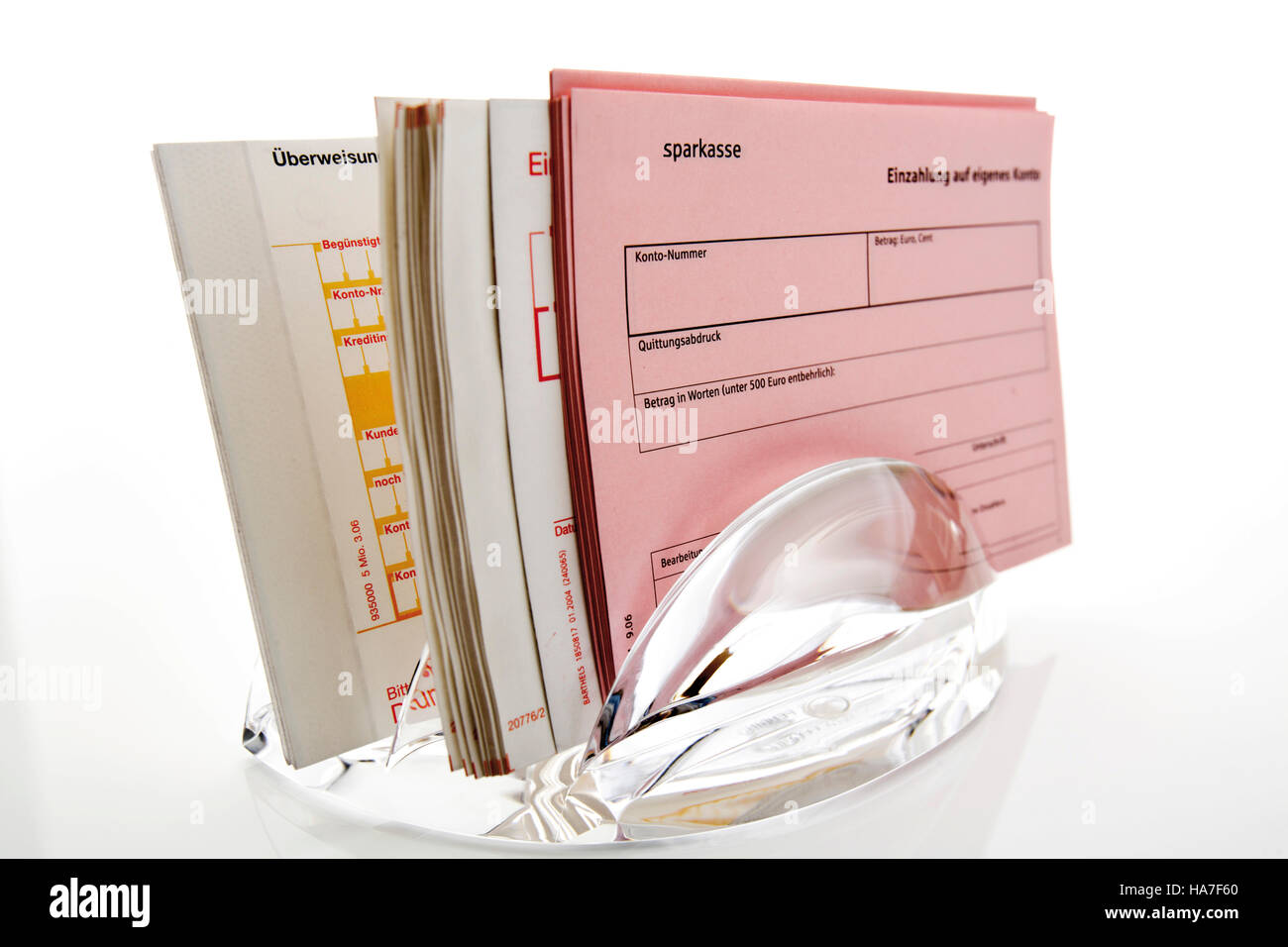 Money transfer forms in a plastic stand Stock Photo - Alamy
