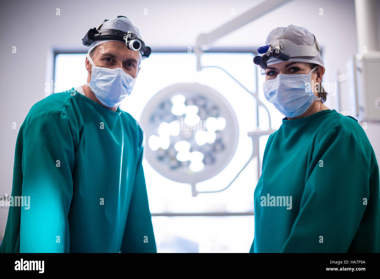 Portrait of surgeons in operation room Stock Photo - Alamy
