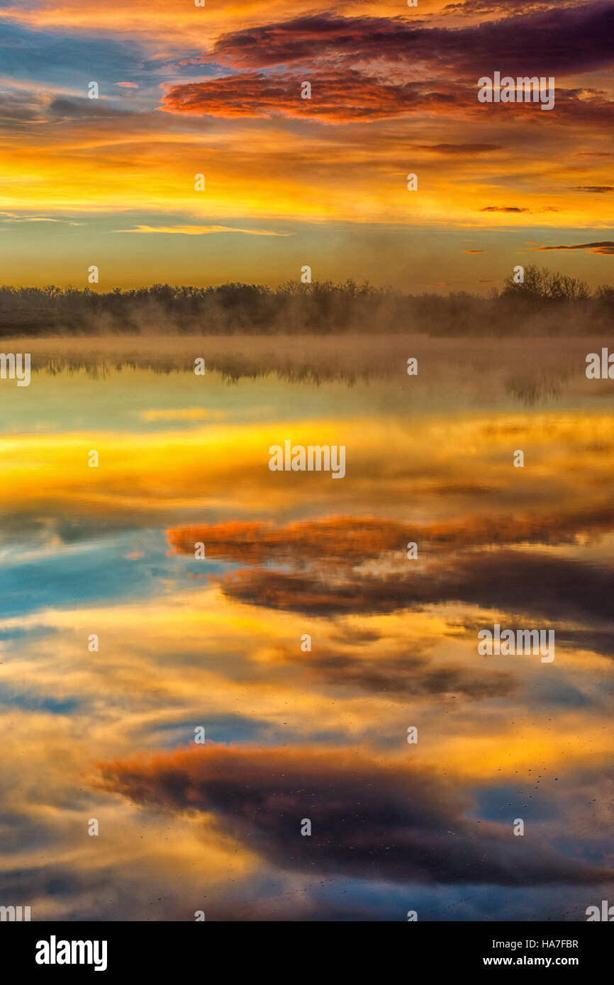 Lake Ladora in Denver, Colorado shows off the sunrise and its ...