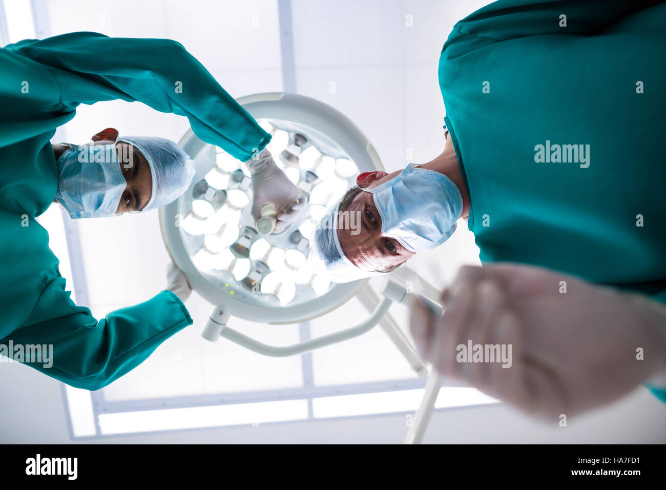 Surgeons operating in operation theater Stock Photo - Alamy