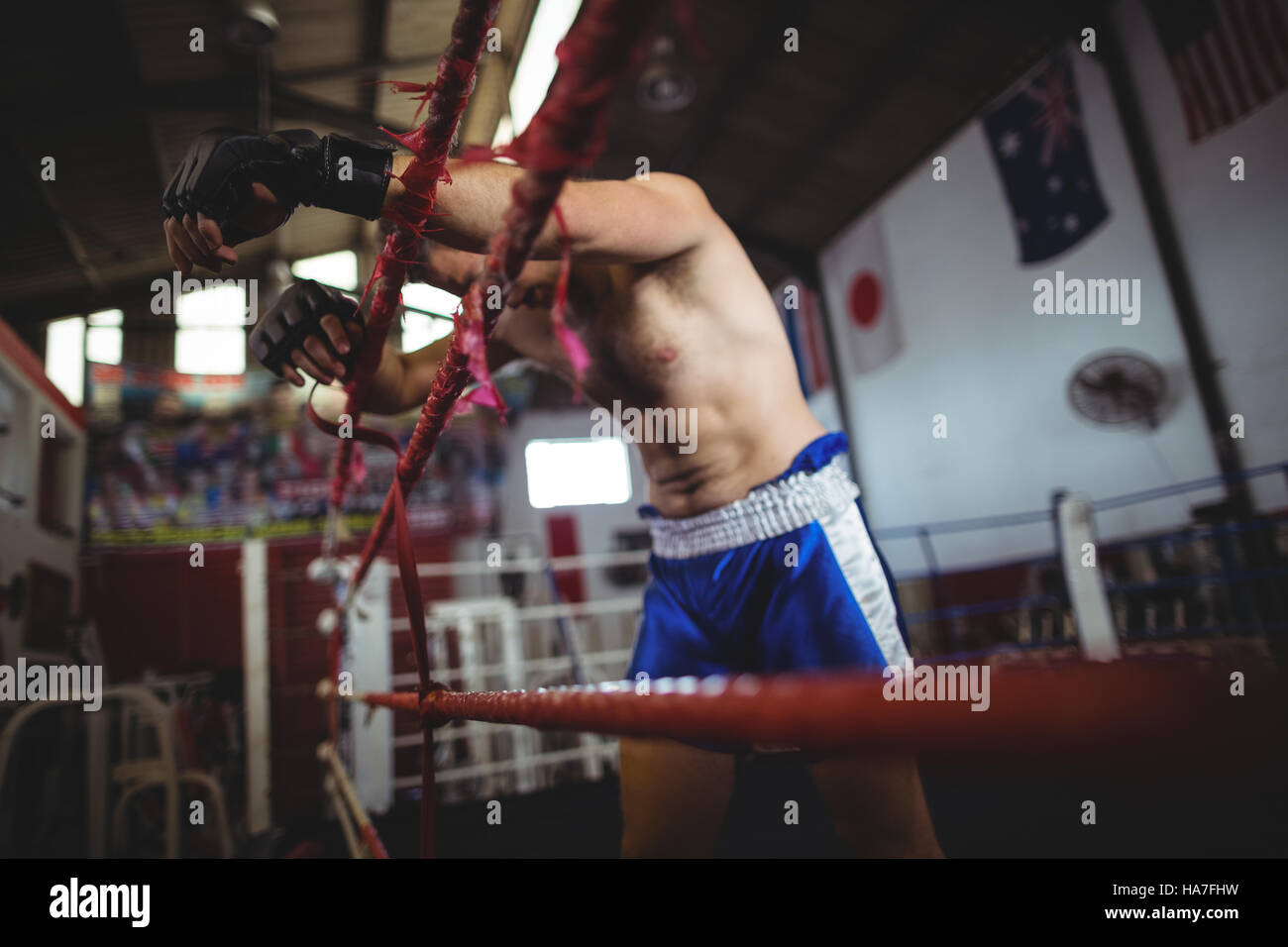 Depressed boxer posing after defeat in boxing ring Stock Photo - Alamy