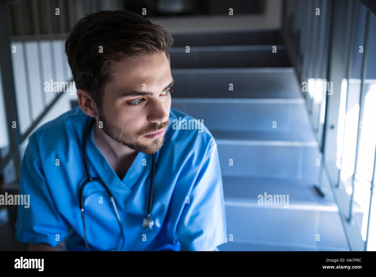 Practitioner man nurse sitting hi-res stock photography and images - Alamy