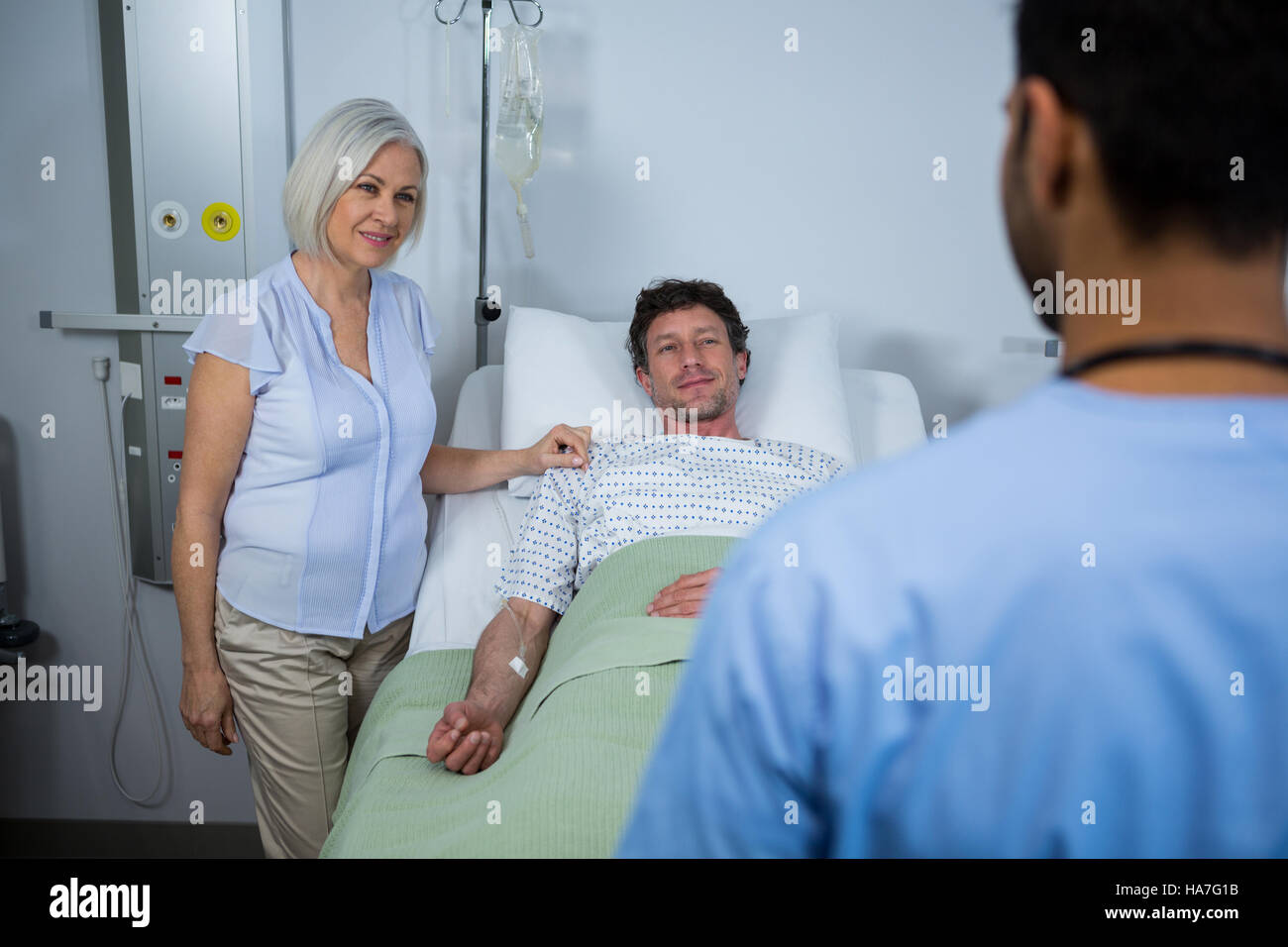 Smiling doctors interacting with each other Stock Photo - Alamy