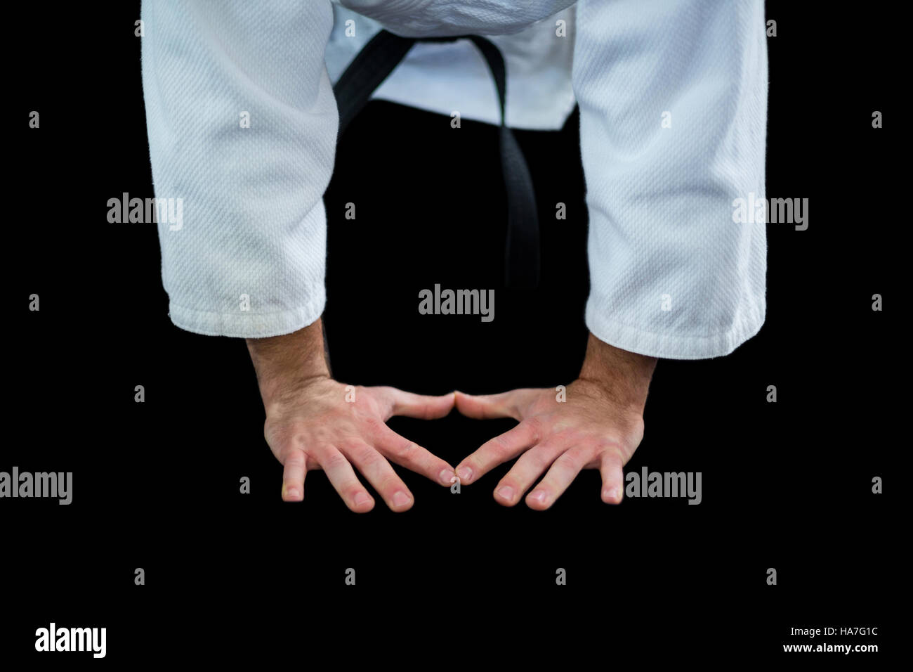 Karate player doing push-up Stock Photo - Alamy