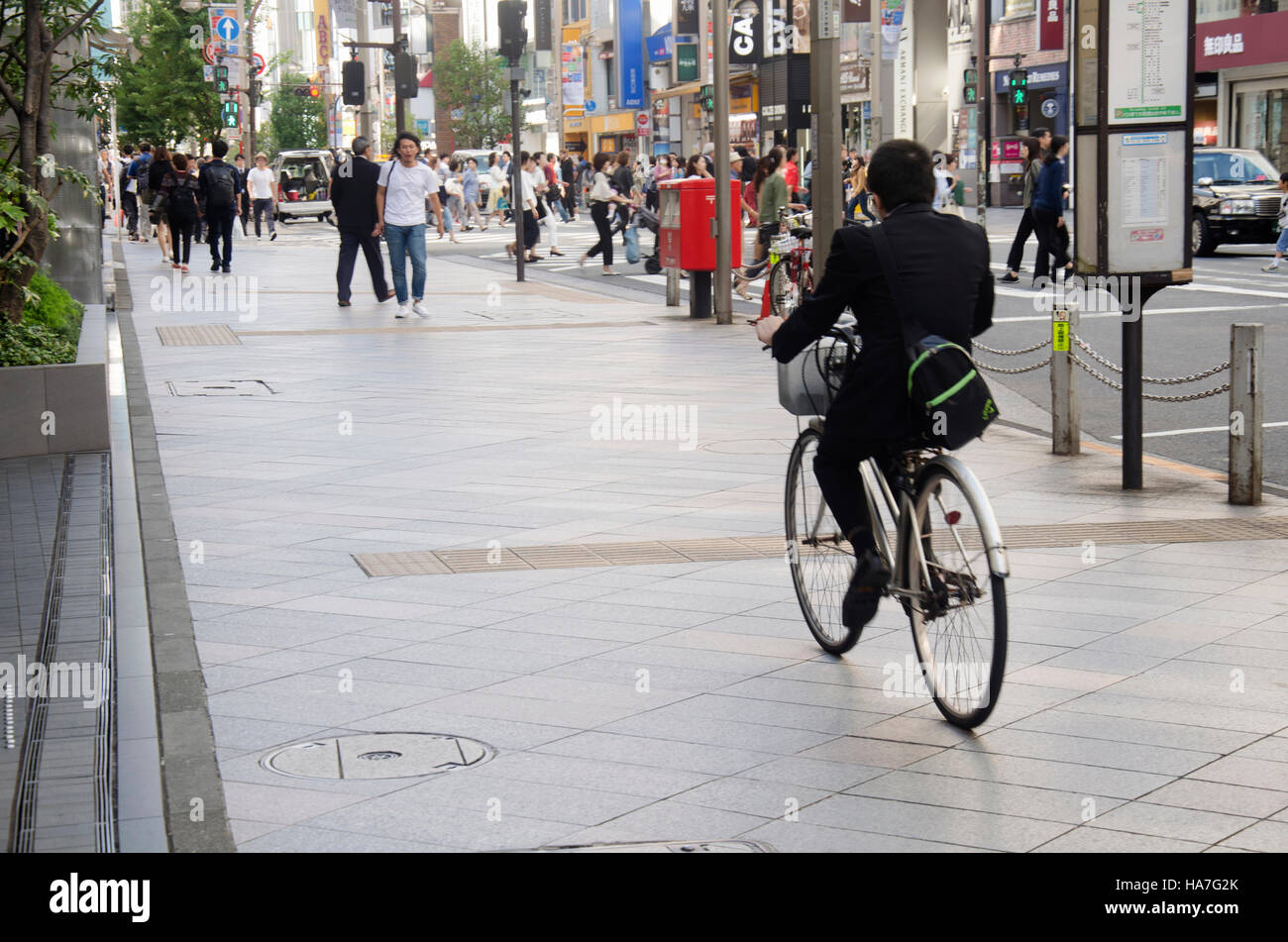 Japanese people walking crosswalk traffic road and biking bicycle on ...