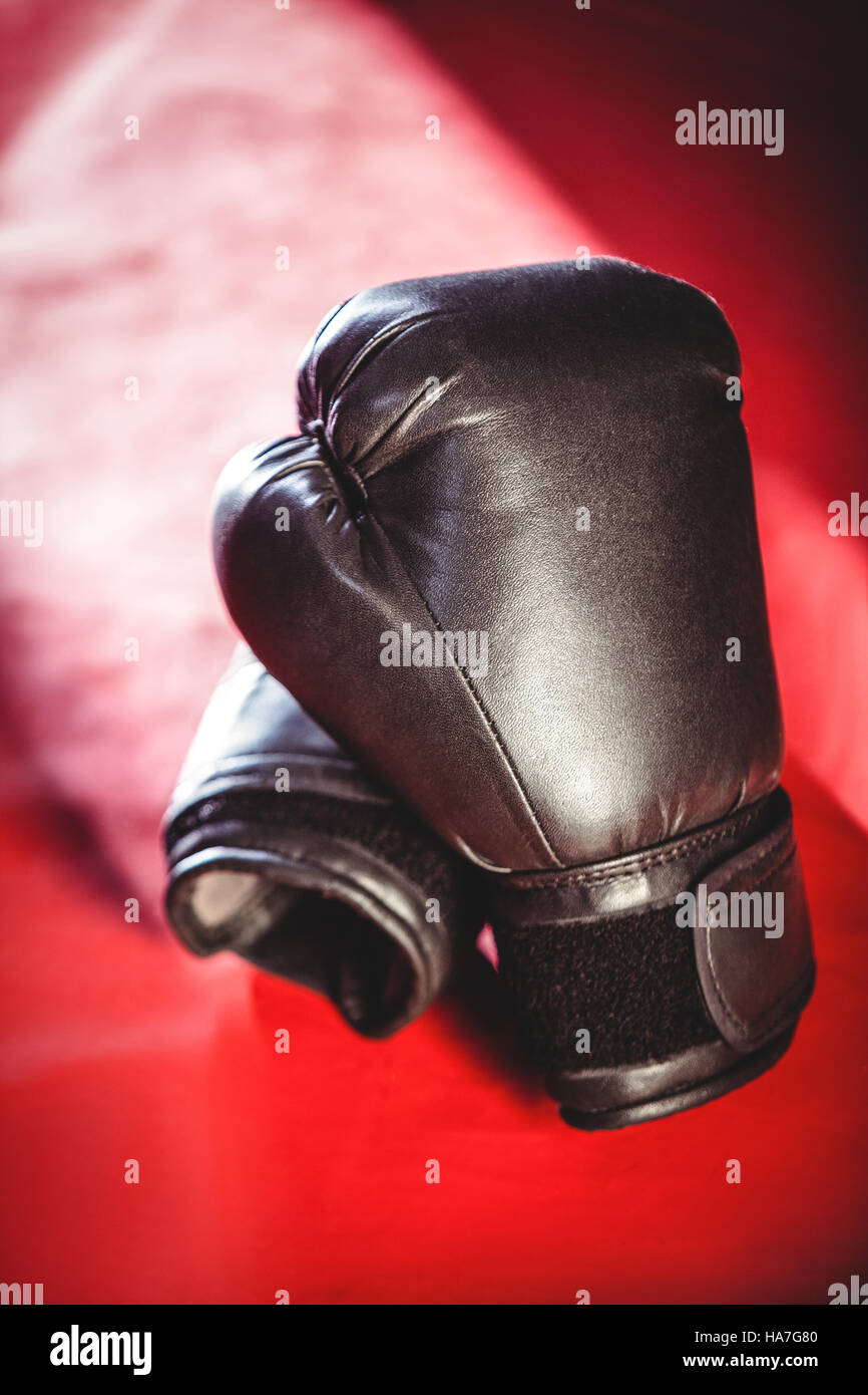 Pair of black boxing gloves Stock Photo - Alamy