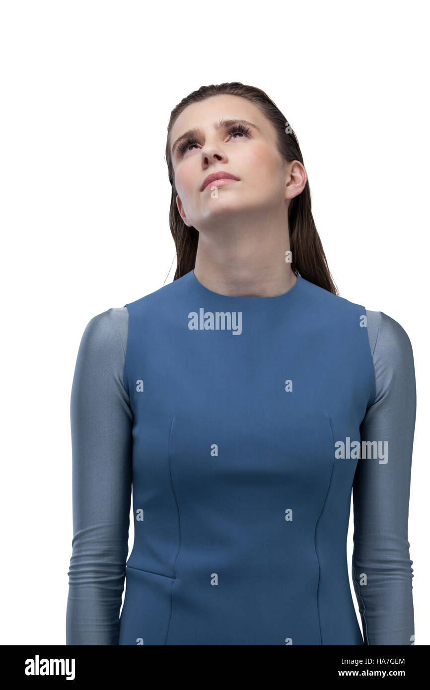 Sad woman looking up Stock Photo - Alamy