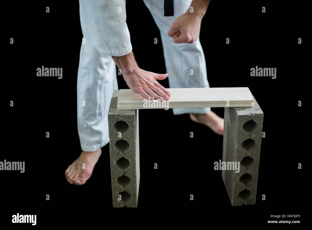 Karate player breaking wooden plank Stock Photo - Alamy Karate player breaking wooden plank Stock Photo - Alamy