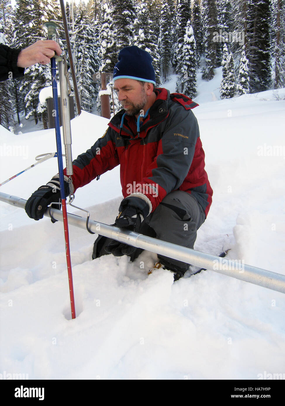 A visitor to a national park reads information about sustainable practices, weight measurements ...