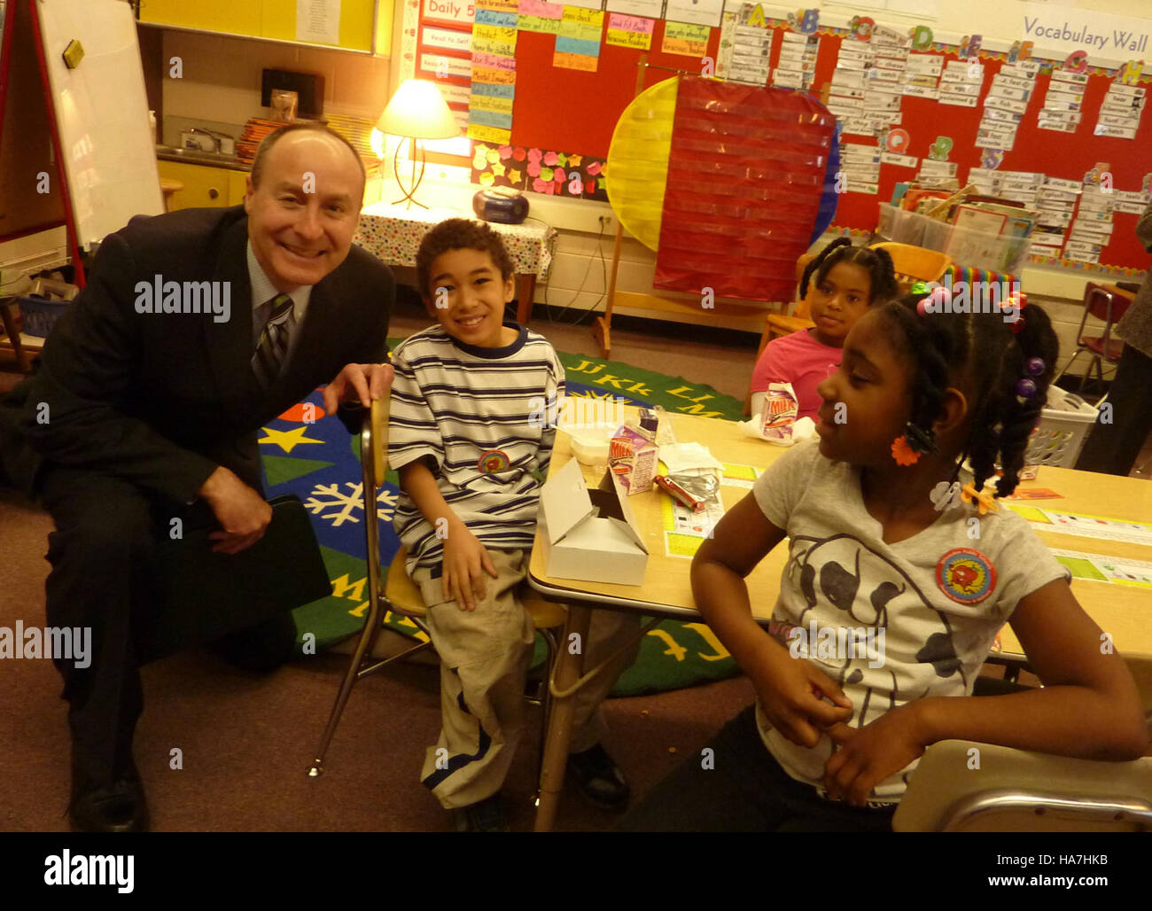 Tim English is pictured with three children, exploring nature in a ...