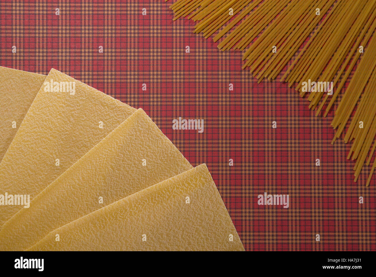 Lasagne sheets and spaghetti pasta background. Flat lay. Top view Stock ...