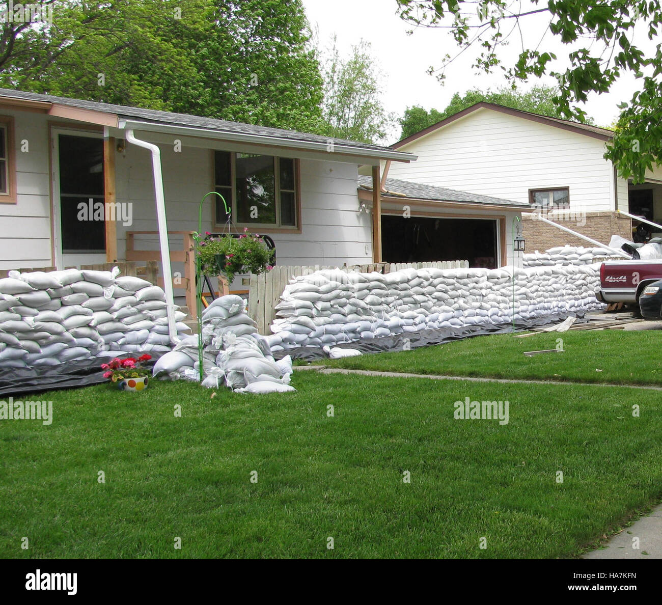This image highlights the effects of flooding, with water levels rising ...