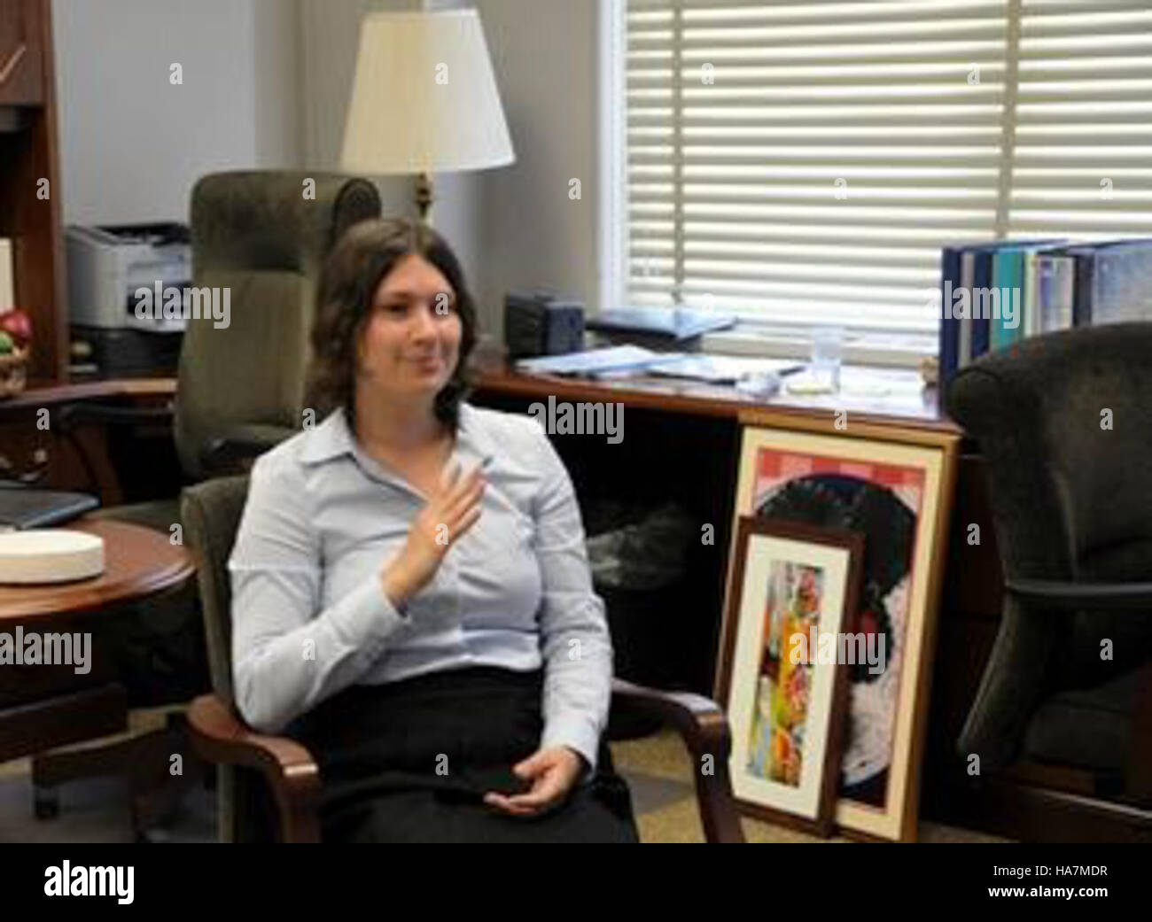 Maya Ariel uses sign language to communicate, demonstrating the ...