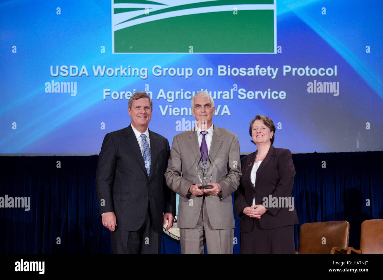 Deputy Secretary of the USDA, Merrigan, and Secretary Vilsack present ...