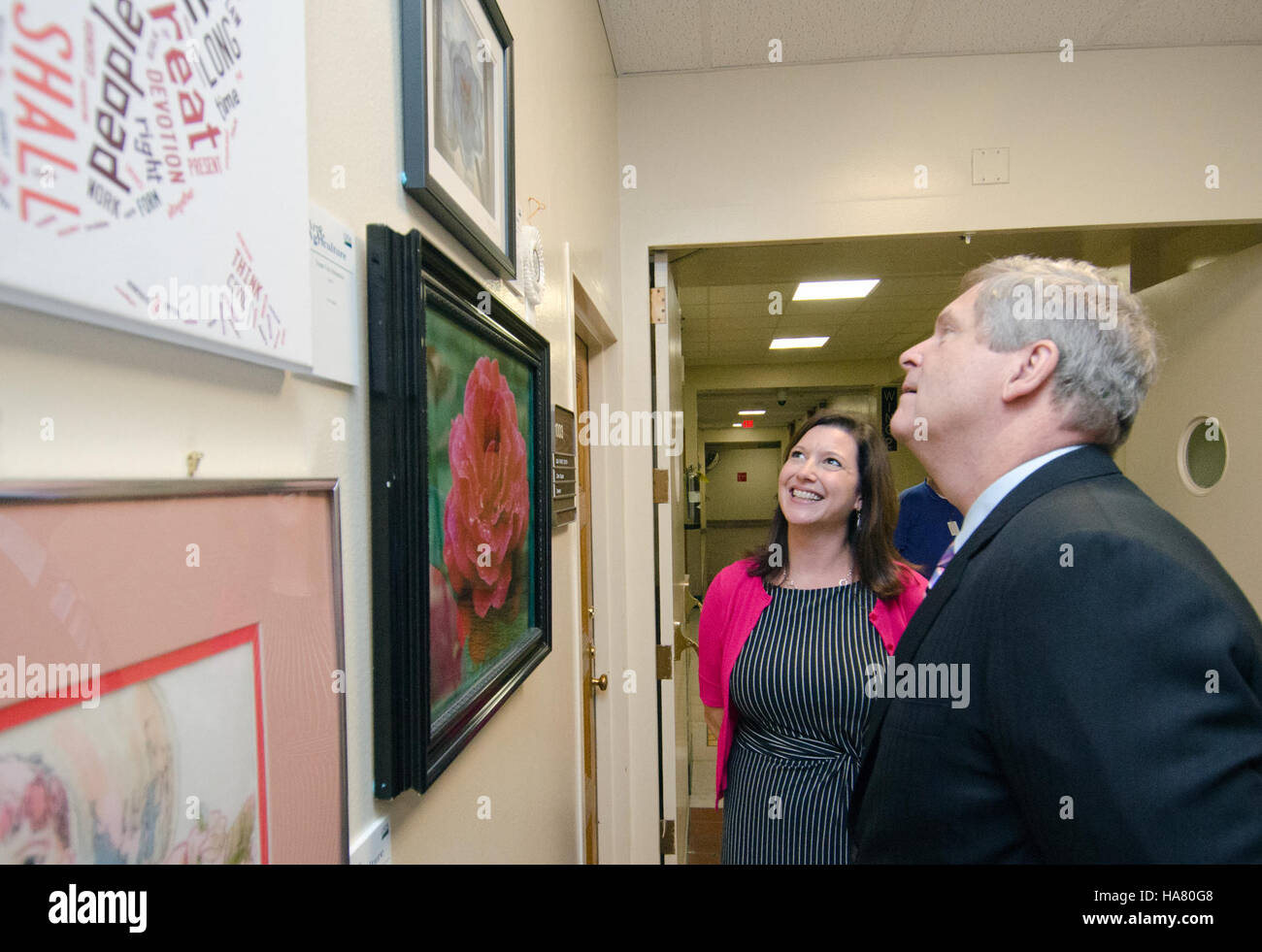 Secretary Thomas Vilsack of the USDA is seen at an art display gallery ...