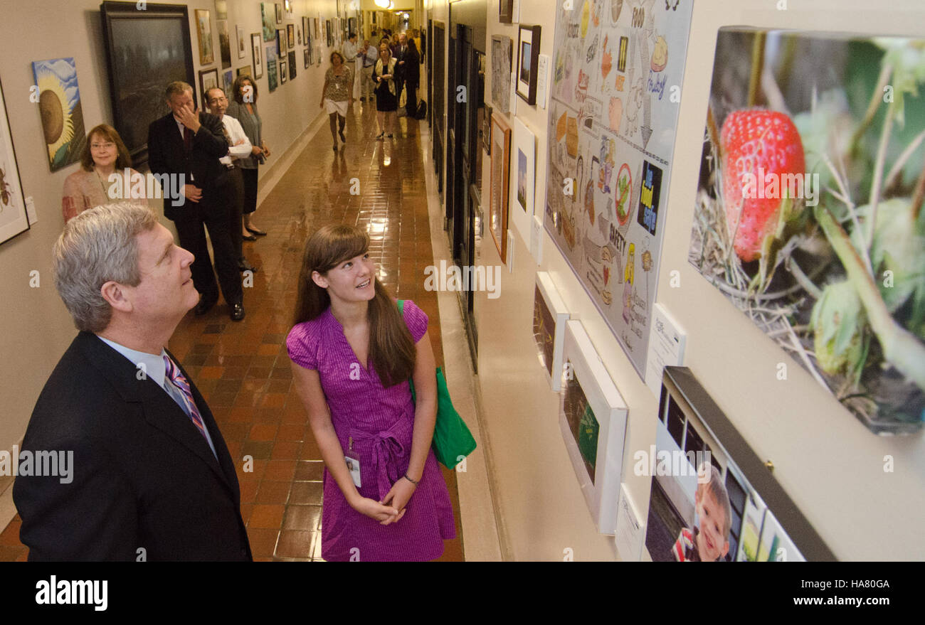 Secretary of Agriculture Thomas Vilsack is pictured at an art display ...