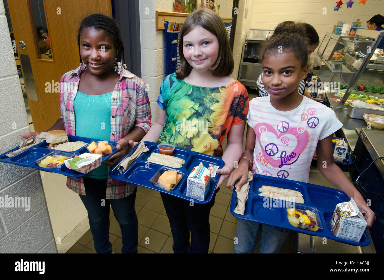 This image highlights the USDA's role in providing healthy school lunch options, including ...