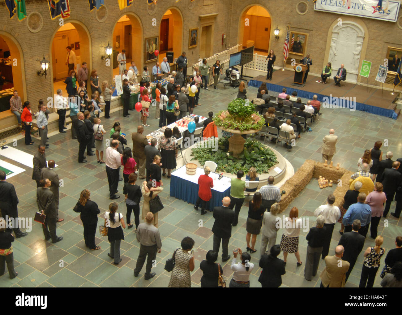 The image shows a federal event at the Whitten Building, part of the U ...