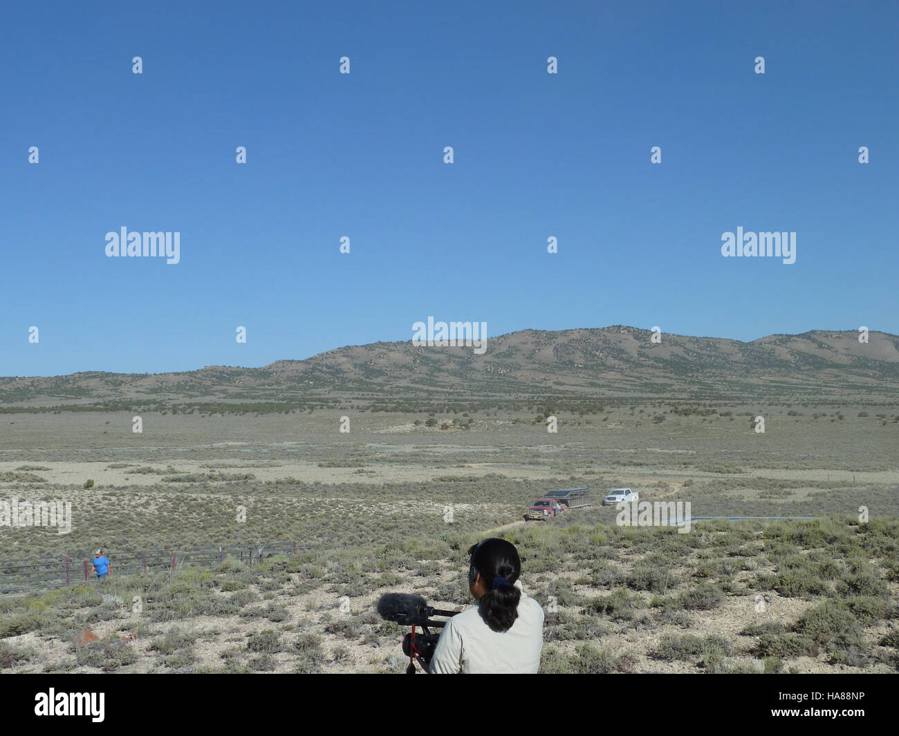 This image is a historical photograph from Nevada, showcasing a mining ...