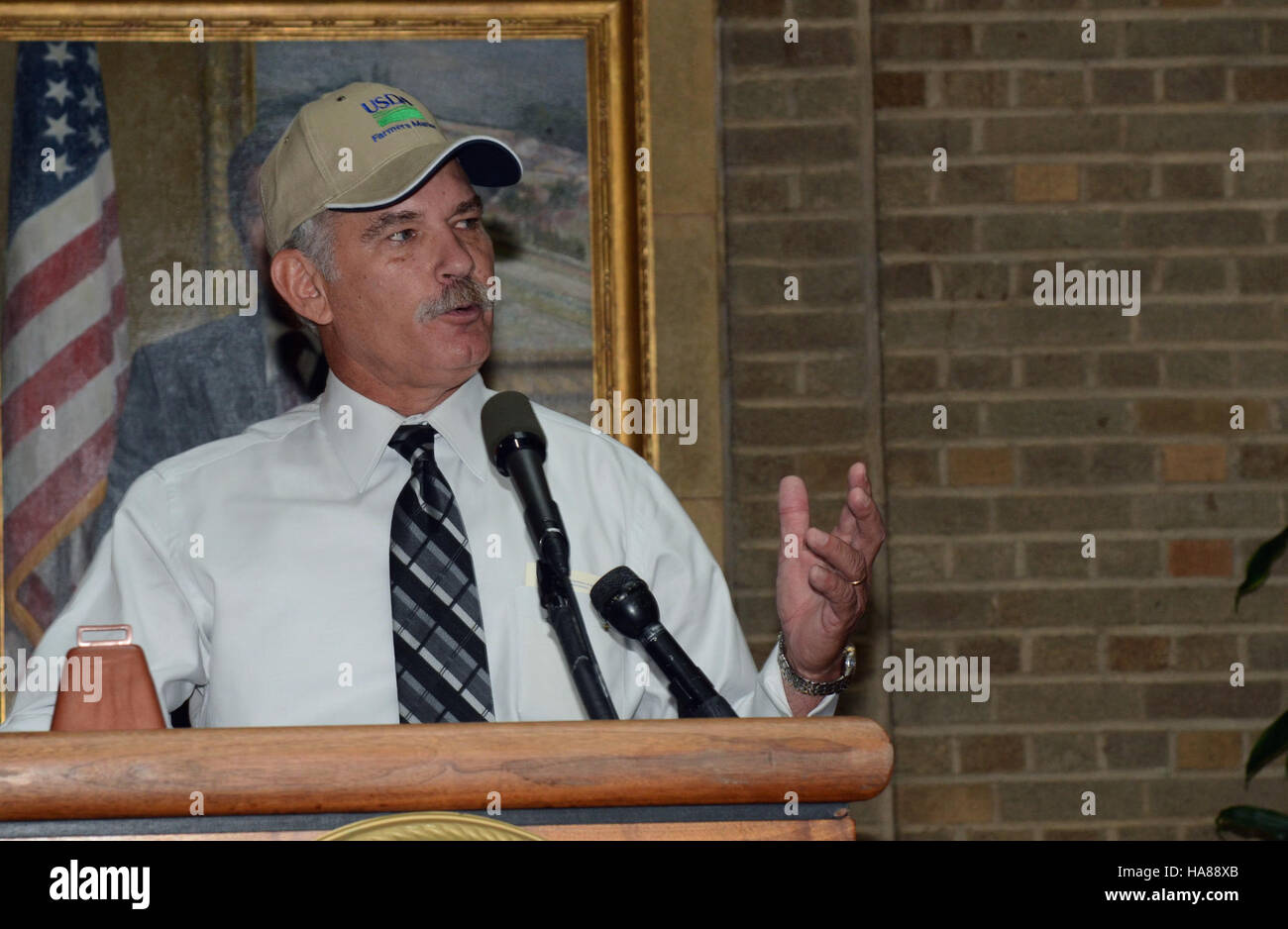 A bell ringing ceremony marks the opening of a farmers' market in ...