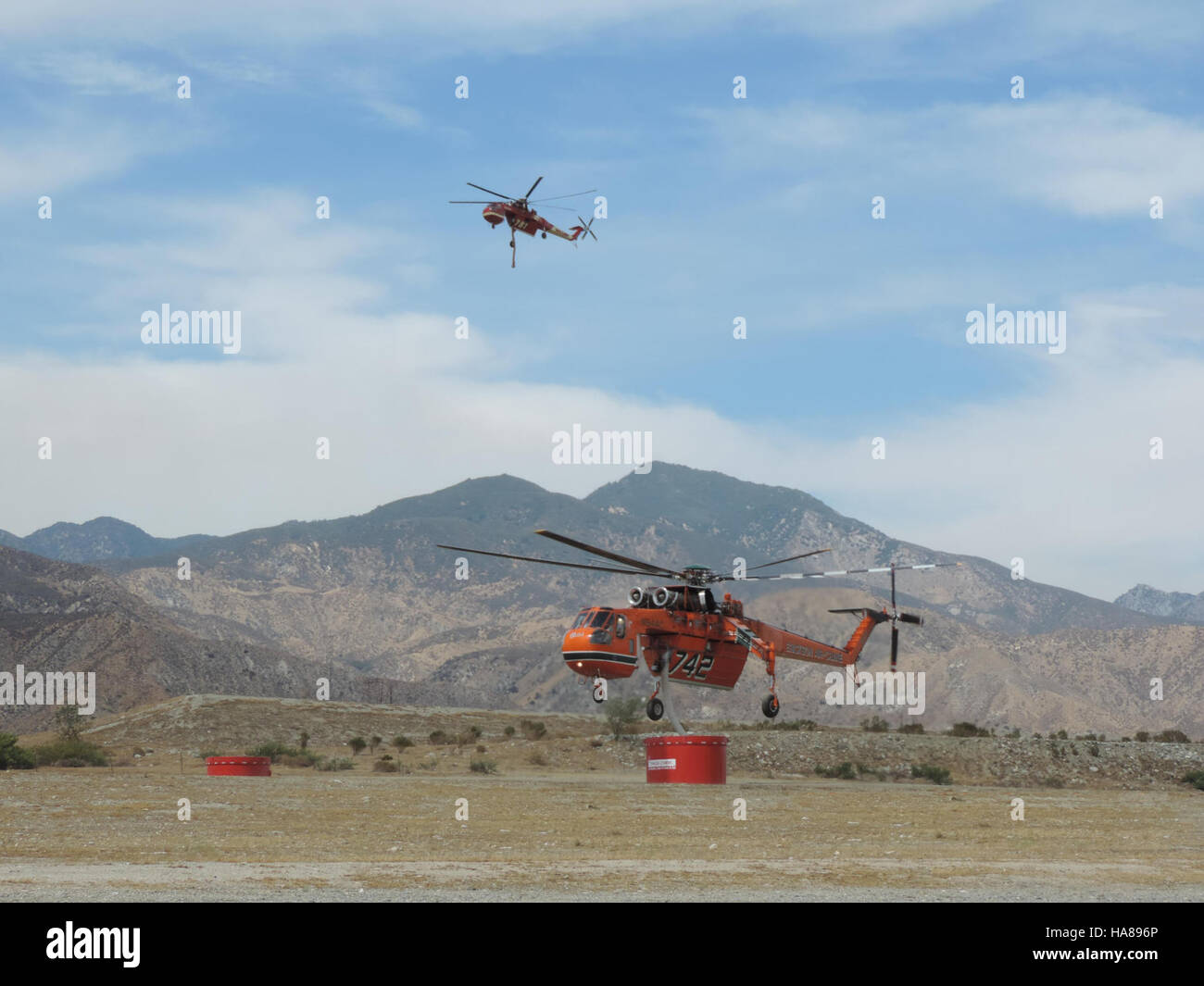 This image captures a helitanker in action during the Hathaway Fire ...