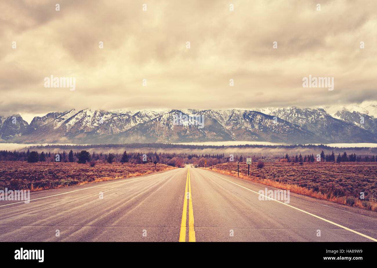 Vintage toned scenic road in the Grand Teton National Park, Wyoming ...
